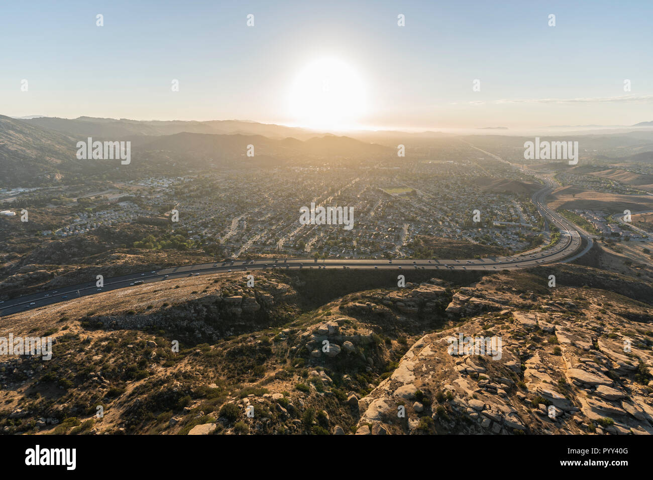Aerial sunset view of the 118 freeway, Santa Susana Mountains and ...