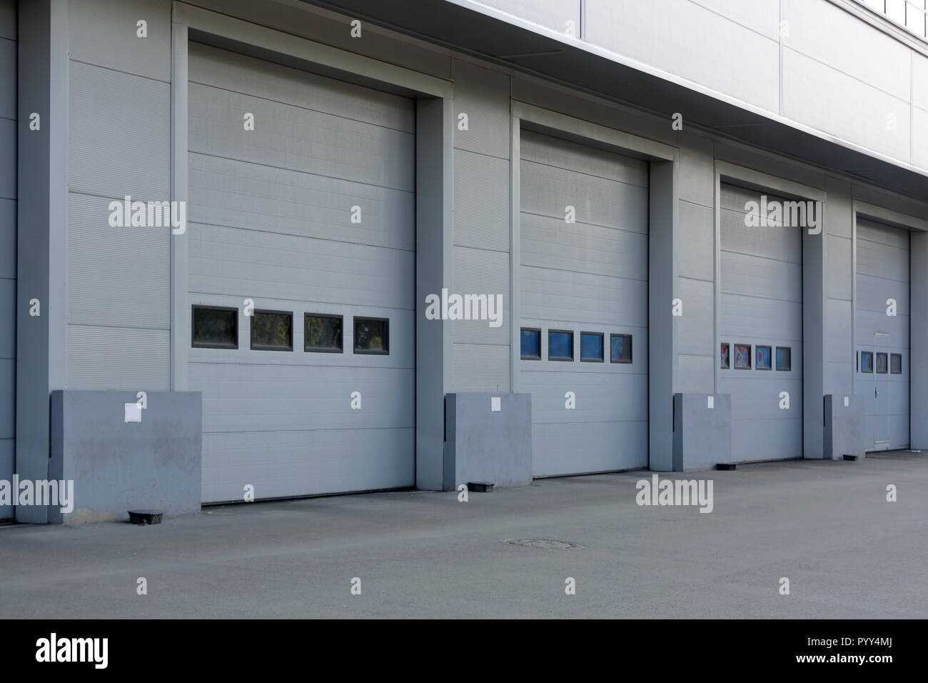 Loading Dock Doors in Cold Distribution Warehouse Stock Photo - Alamy
