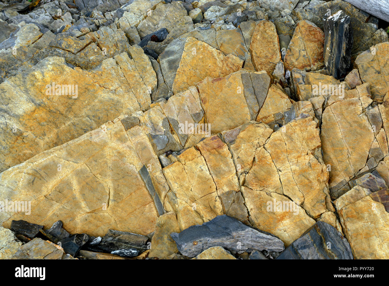 Jagged rock detail with geometric patterns Stock Photo - Alamy