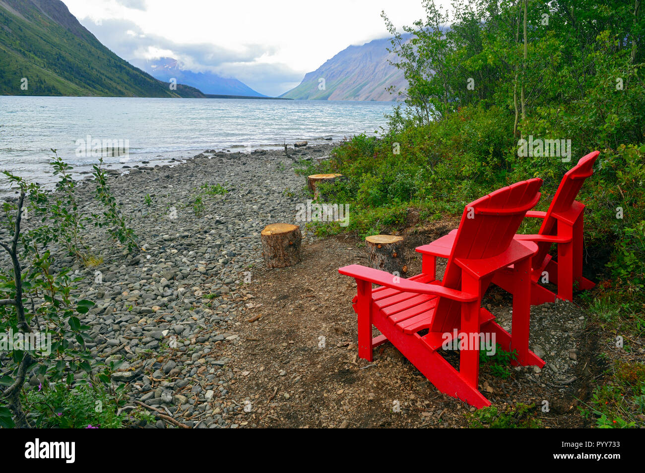 Red Chairs by Kathleen Lake in Yukon Territory, Canada Stock Photo - Alamy