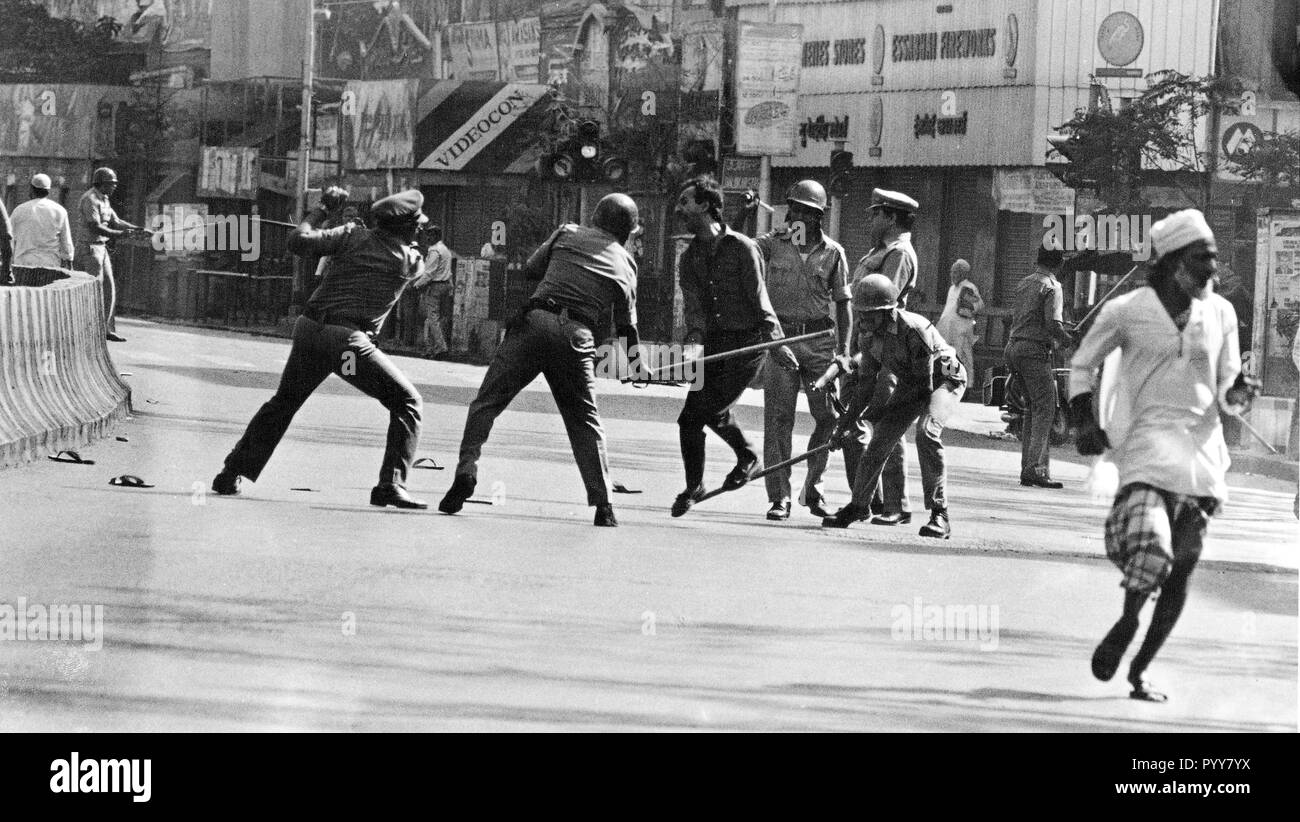 Police beating man with sticks during riots, hindu muslim riots, Mumbai ...