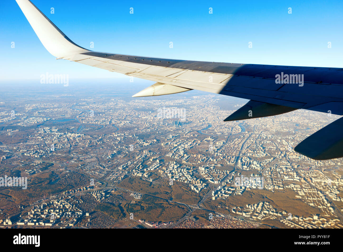 Aerial view from a flying plane in the sky Stock Photo - Alamy