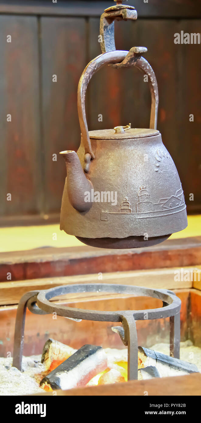 Japanese old kettle pot over charcoal stove Stock Photo - Alamy