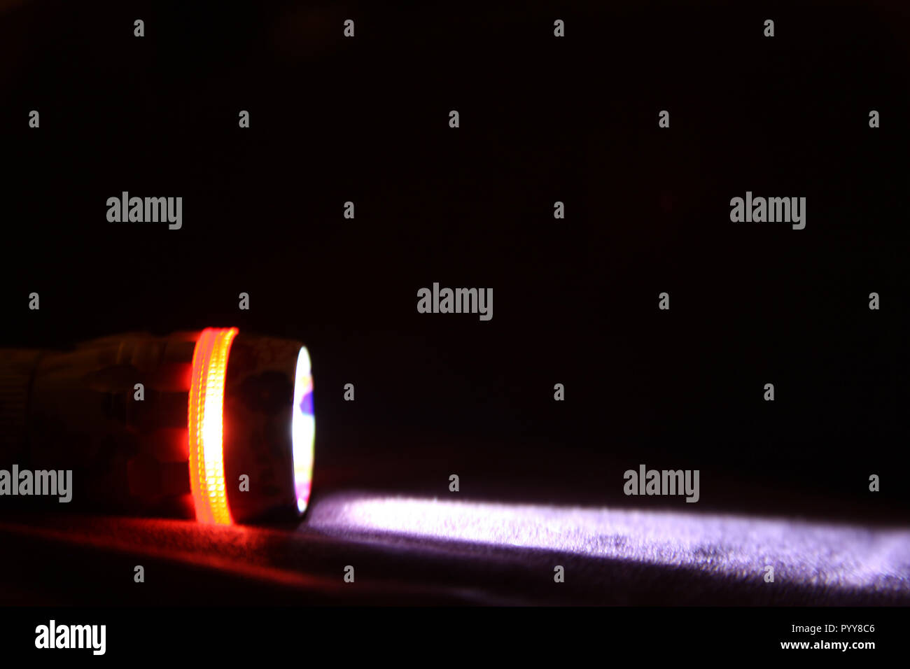 Light Beam from Electric Flashlight Stock Photo - Alamy