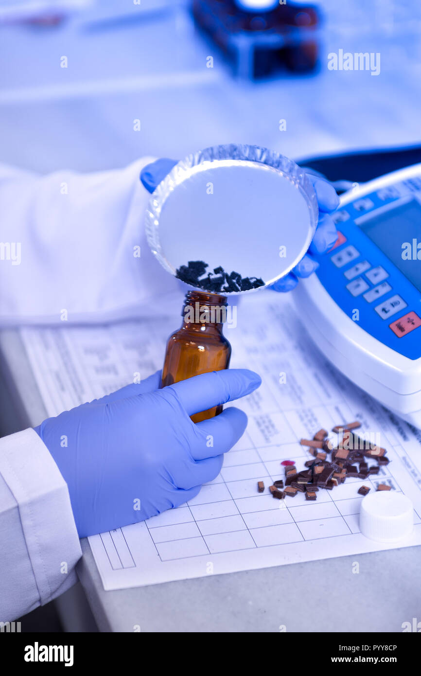 Liquid bottles in laboratory and particle analysis Stock Photo - Alamy
