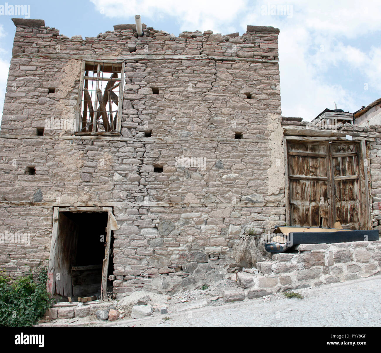 Demolished stone rock door hi-res stock photography and images - Alamy