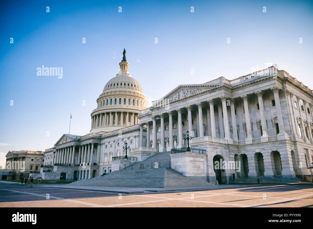 Bright mid-day view of the traditional neoclassical architecture of the ...