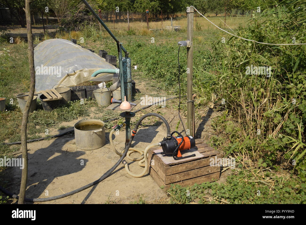 Irrigation system in the home garden. Well with manual and automatic ...