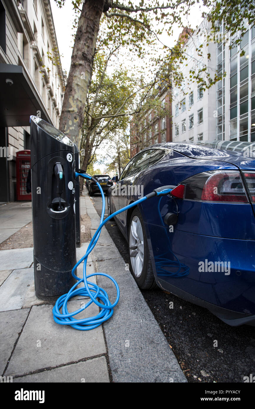 Tesla Model S electric car charging on the street in central London ...