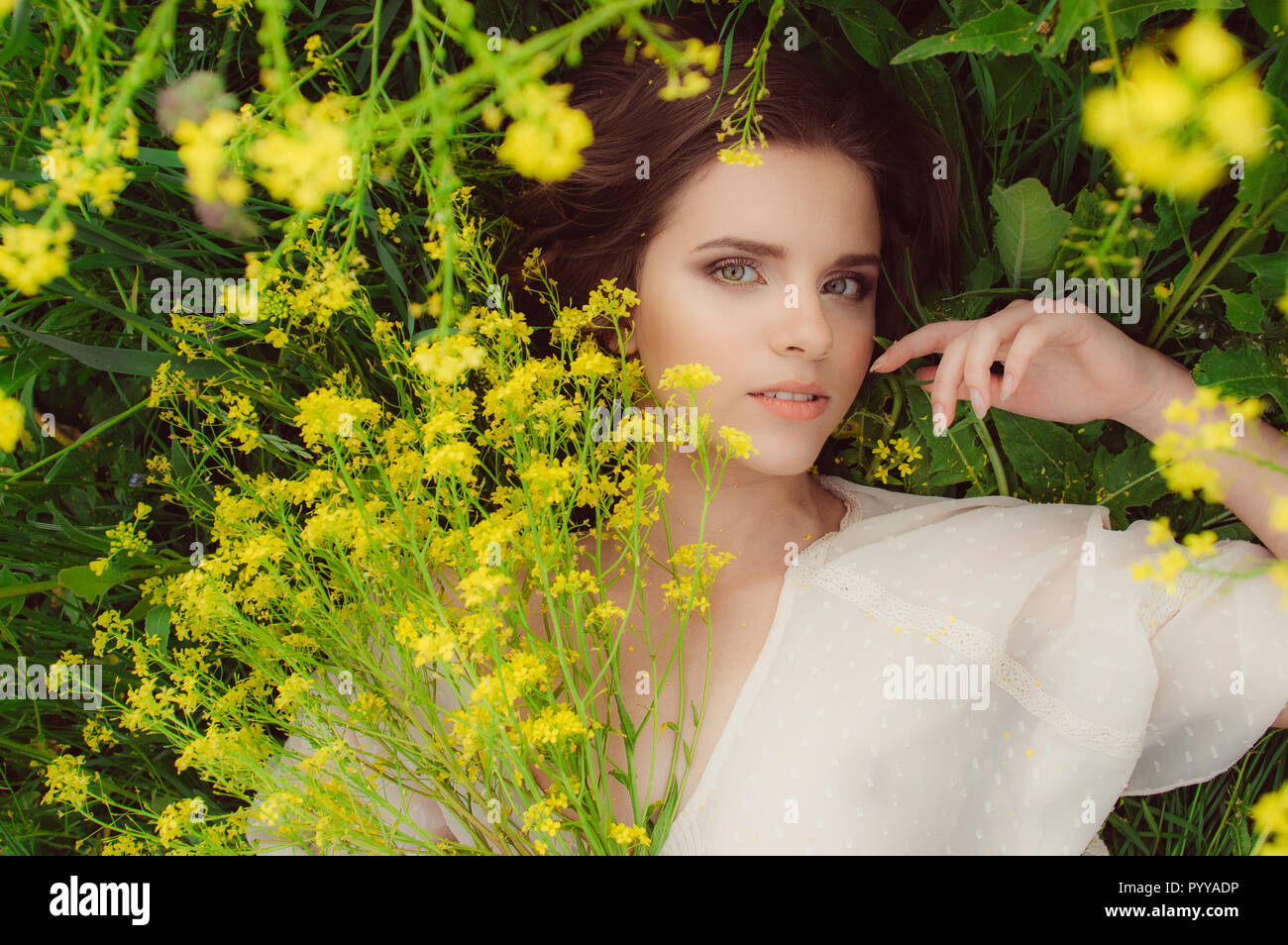 People laying flowers hi-res stock photography and images - Alamy