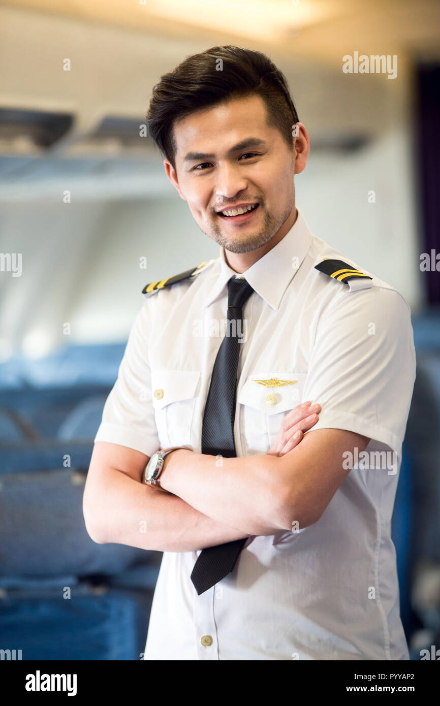 Male flight attendant uniform hi-res stock photography and images - Alamy