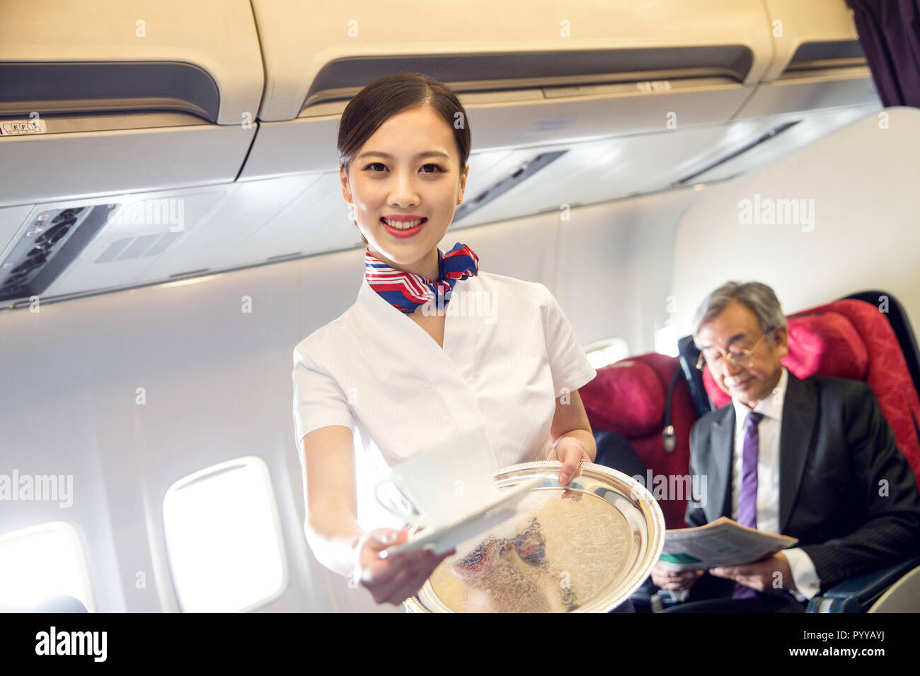 The plane cabin service Stock Photo - Alamy