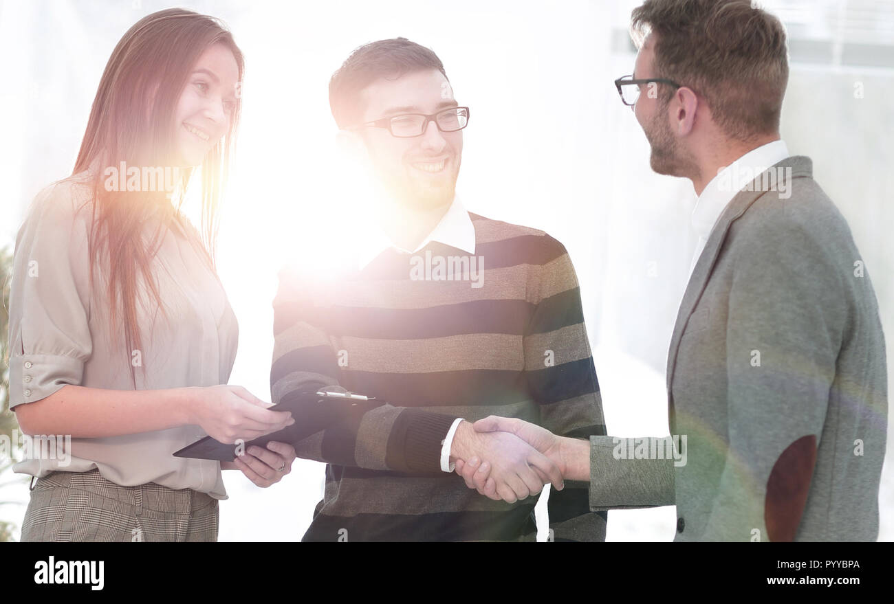 friendly handshake between colleagues Stock Photo - Alamy