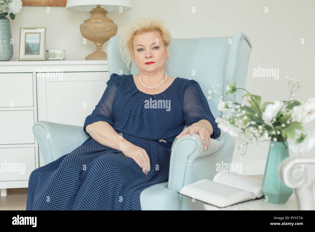 Older woman at home, portrait Stock Photo - Alamy