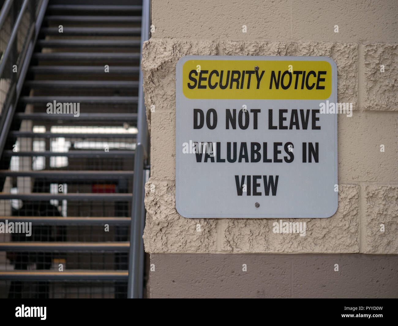 Security notice do not leave valuables in view street sign near parking ...