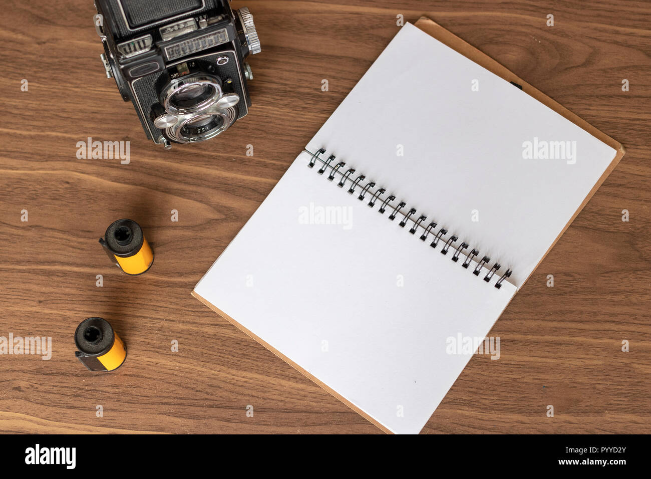 Taking notes of photography on the desk Stock Photo - Alamy