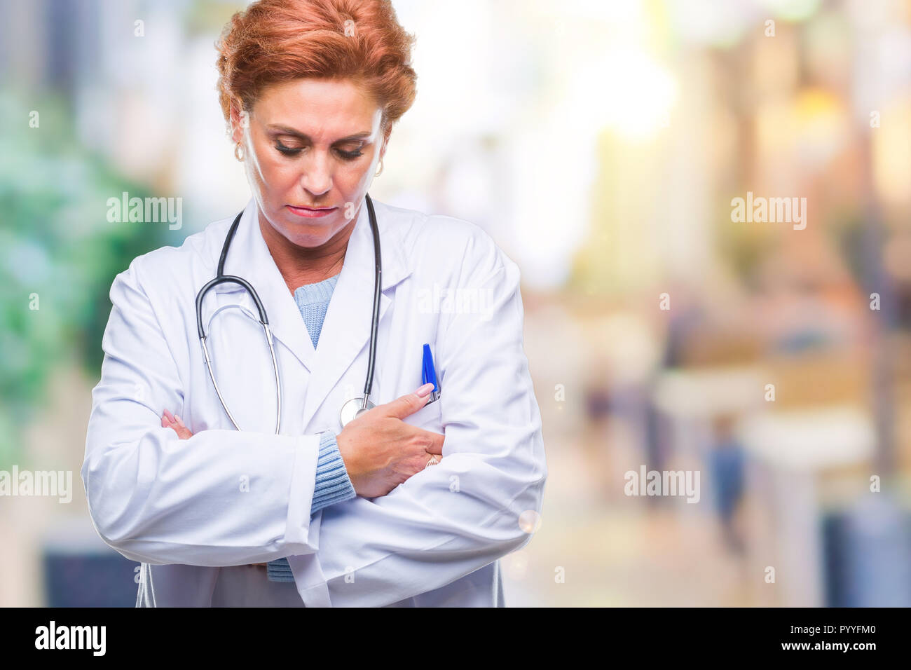 Senior caucasian doctor woman wearing medical uniform over isolated ...