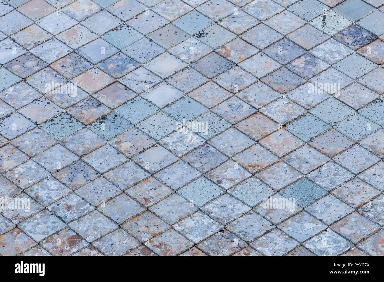 Old stone roof tiles in ordered diagonal pattern, for textured ...