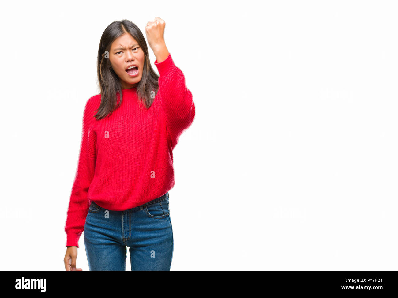 Young asian woman wearing winter sweater over isolated background angry ...