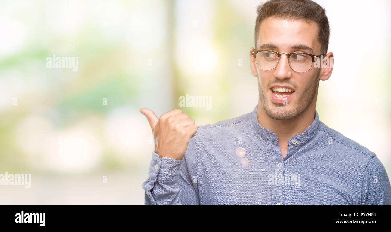 Happy elegant man showing thumb hi-res stock photography and images - Alamy