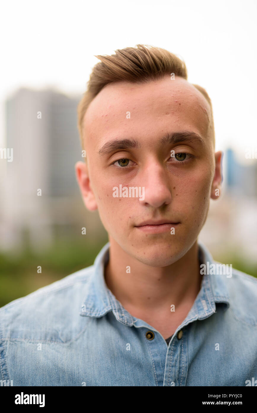 Handsome young man in denim hi-res stock photography and images - Alamy