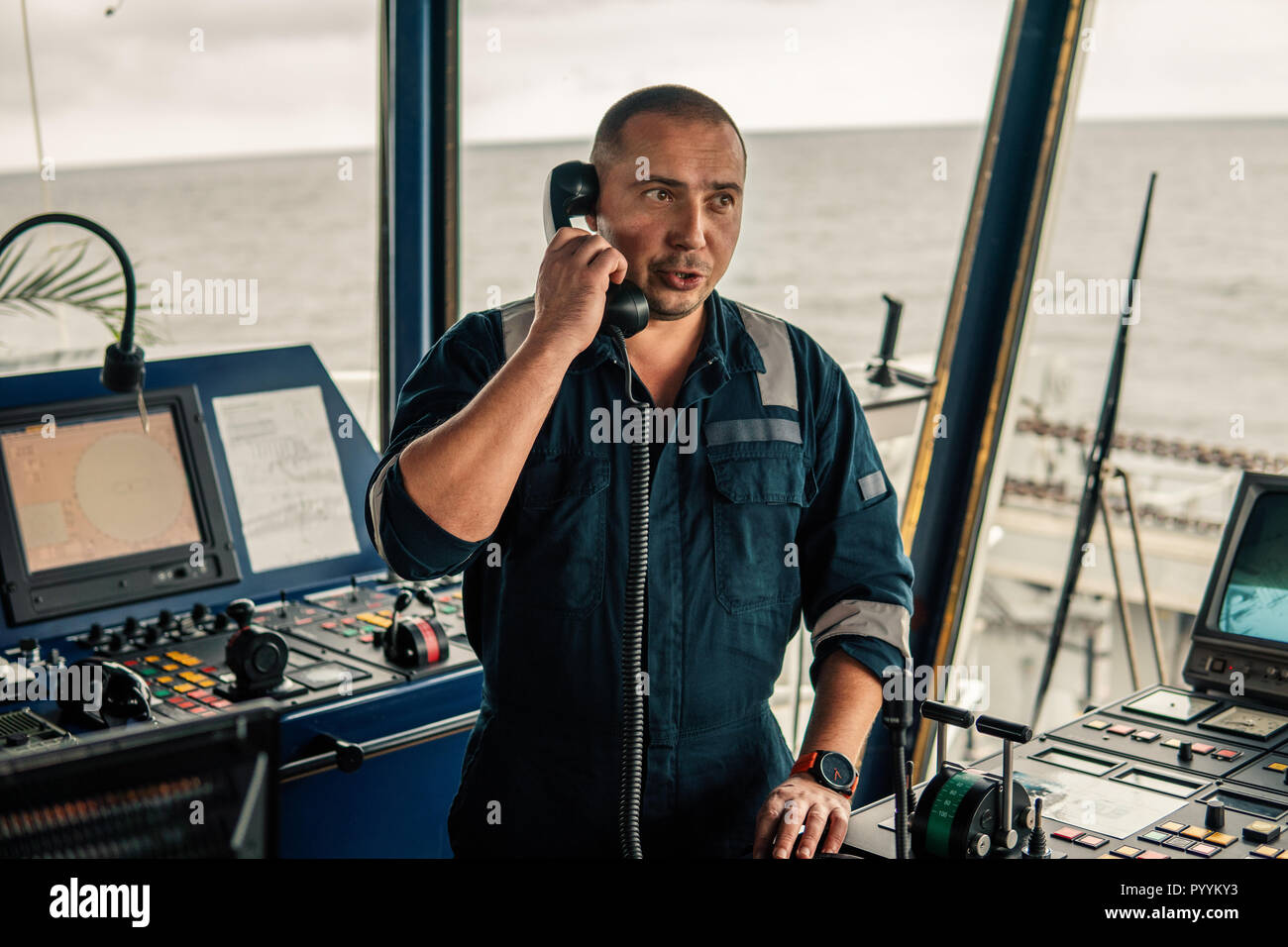 Marine navigational officer is reporting by VHF radio Stock Photo - Alamy