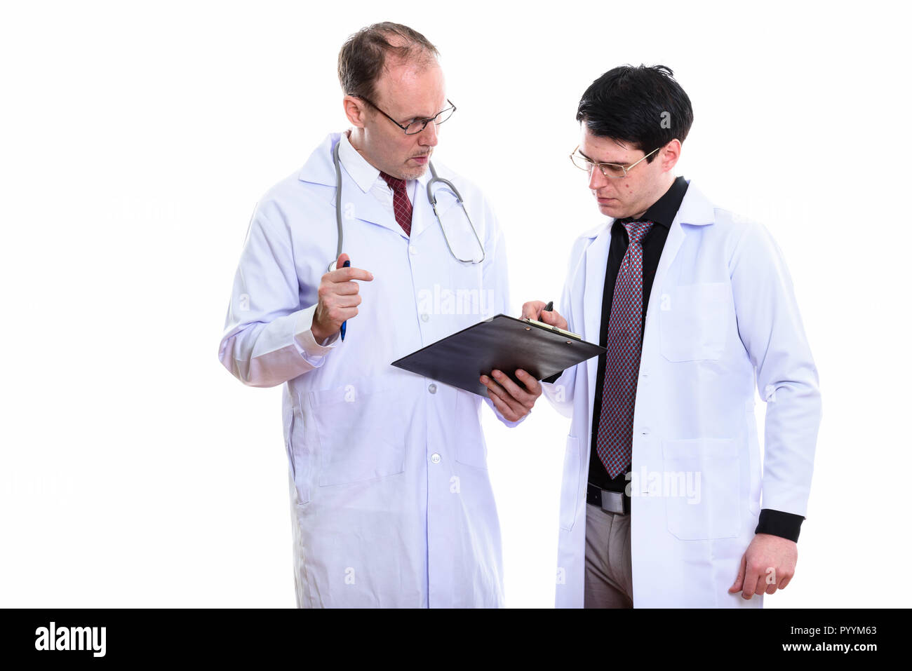 Doctor man writing hi-res stock photography and images - Alamy