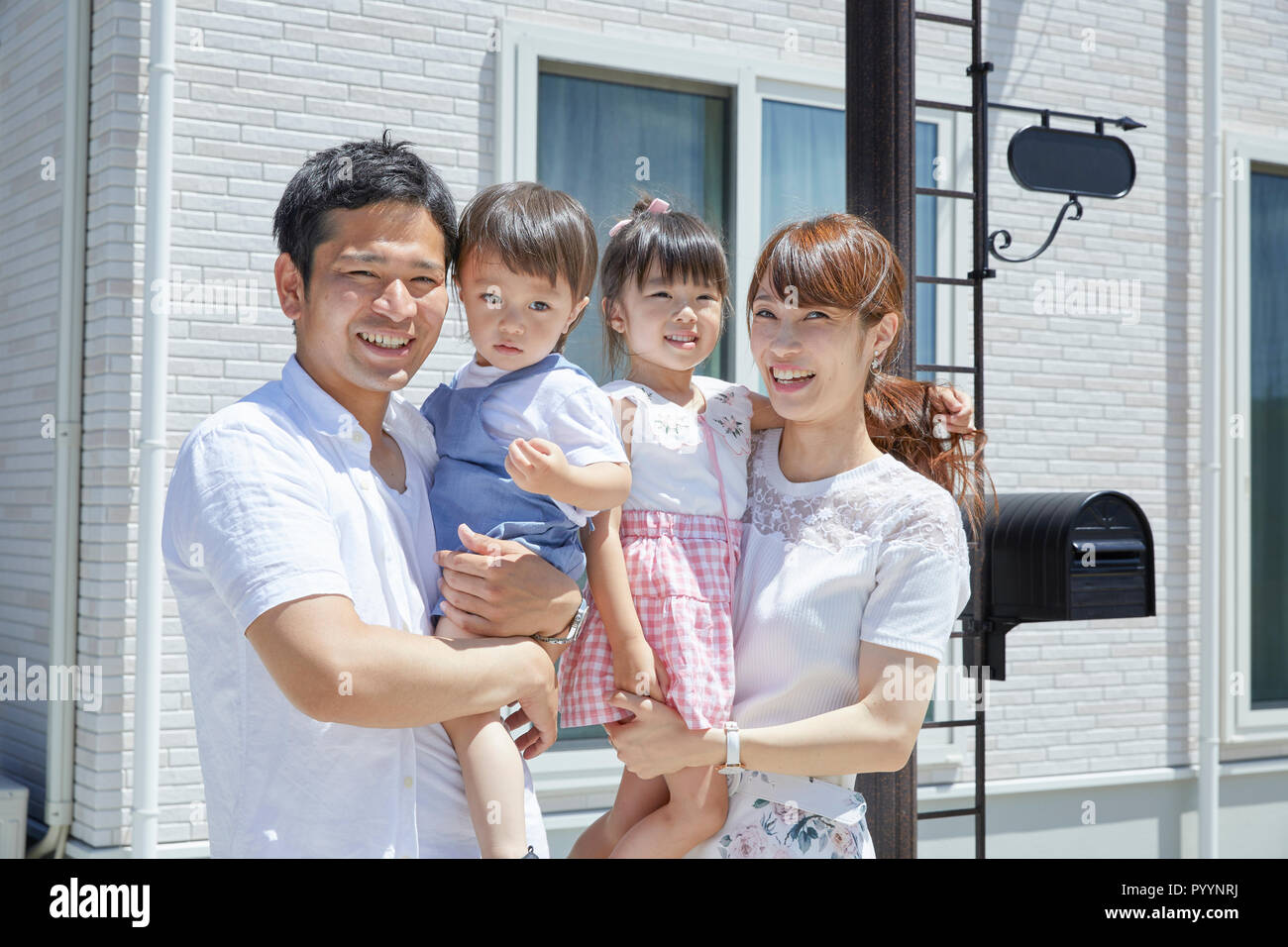 Japanese family at home Stock Photo - Alamy