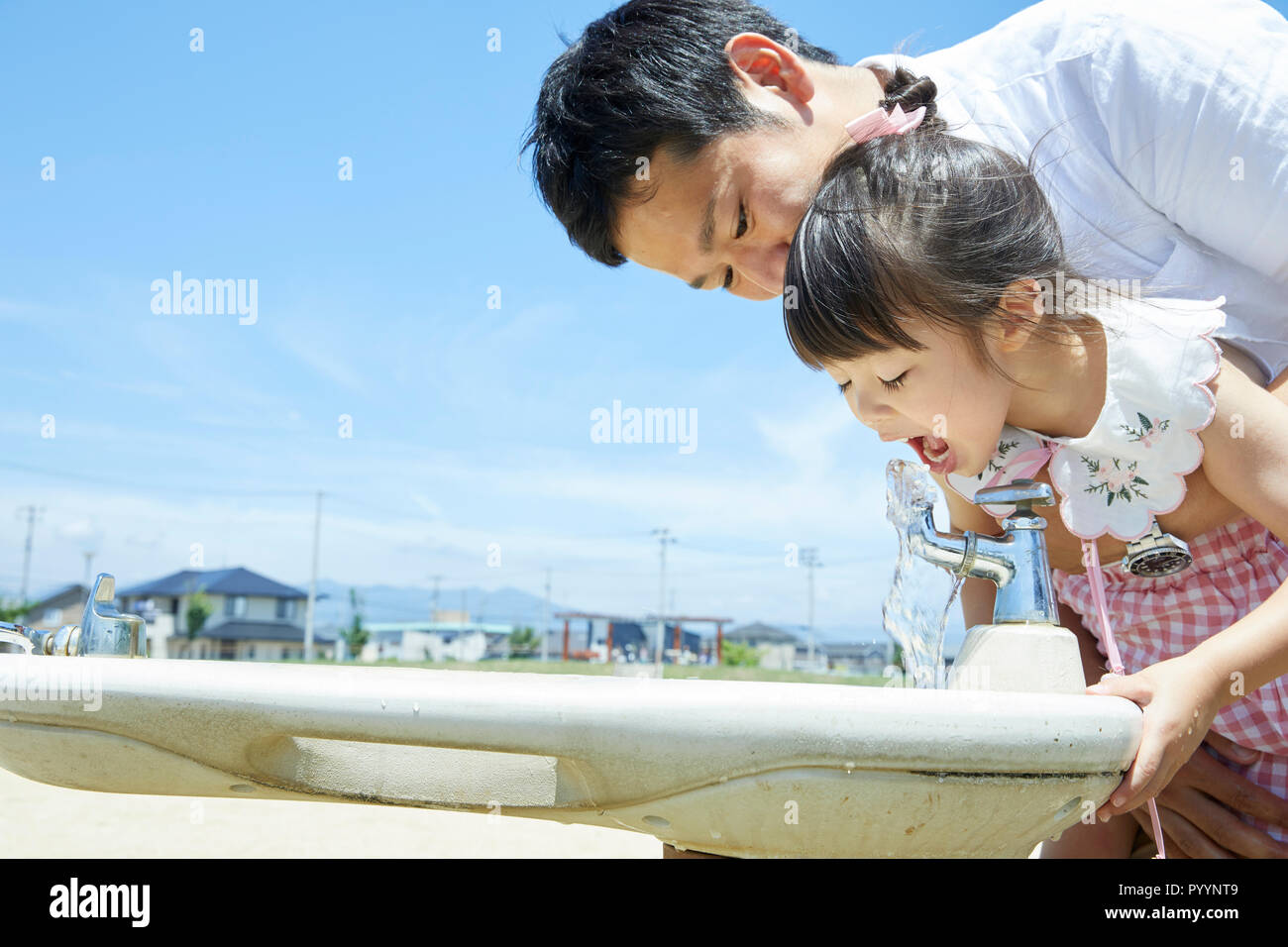 Girl drinking water japan hi-res stock photography and images - Alamy