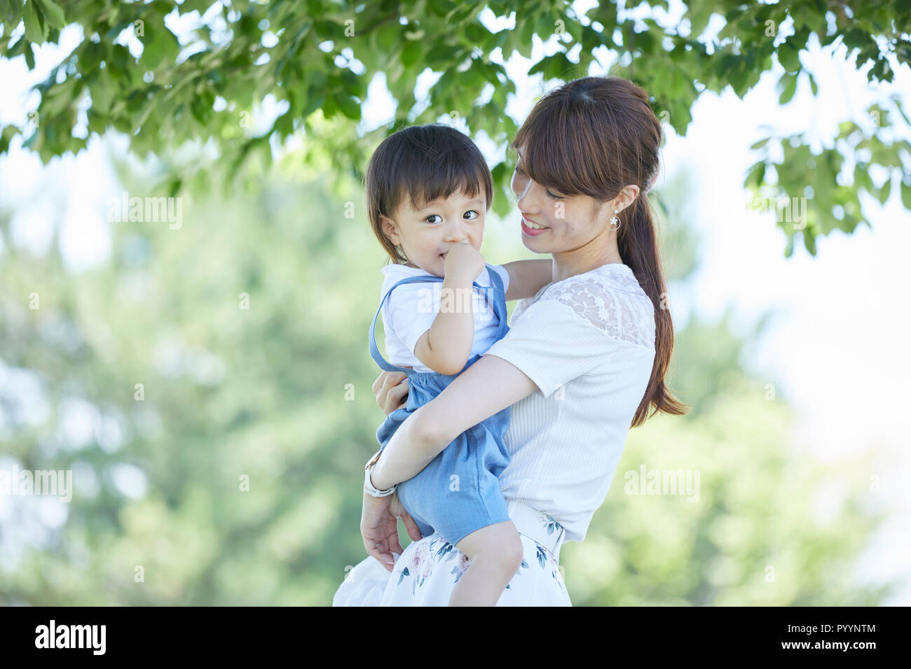 Japanese mother and son at the park Stock Photo - Alamy