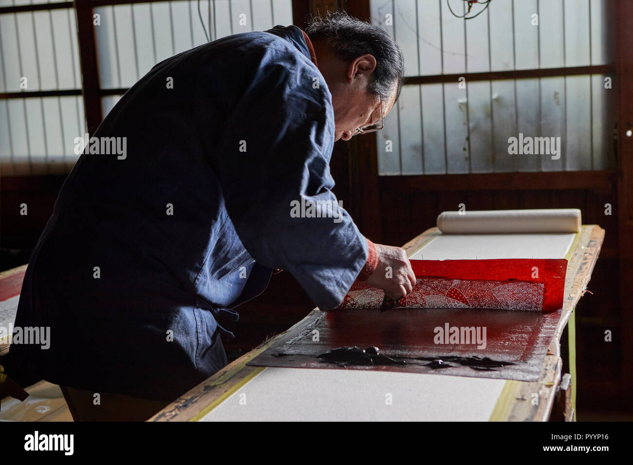 Japanese artisan working in the studio Stock Photo - Alamy