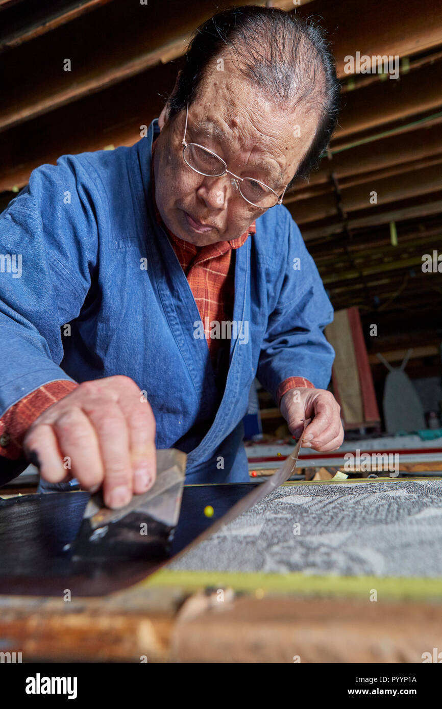 Japanese artisan working in the studio Stock Photo - Alamy