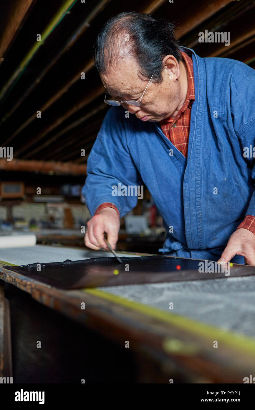 Japanese artisan working in the studio Stock Photo - Alamy