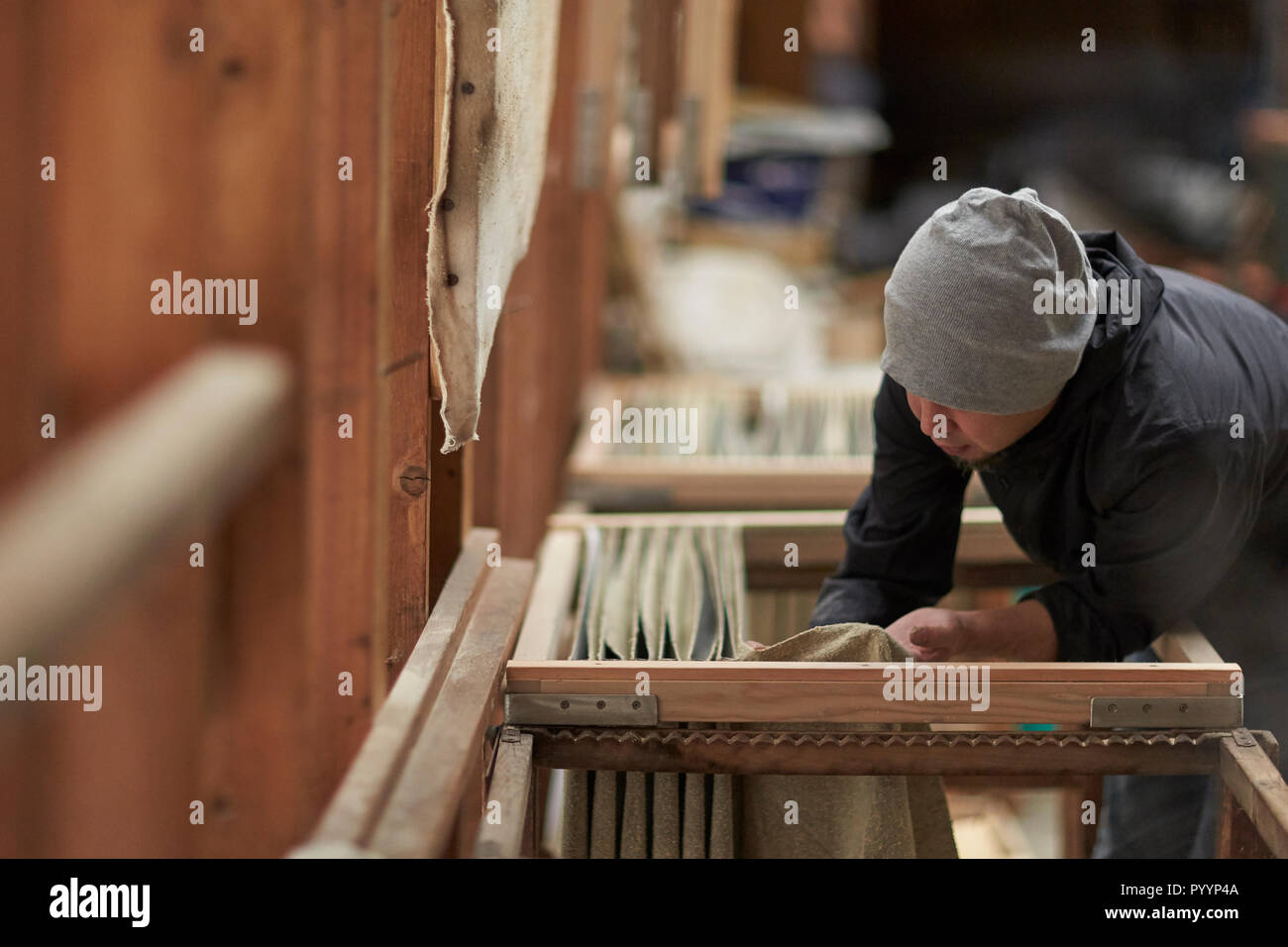 Japanese artisan working in the studio Stock Photo - Alamy