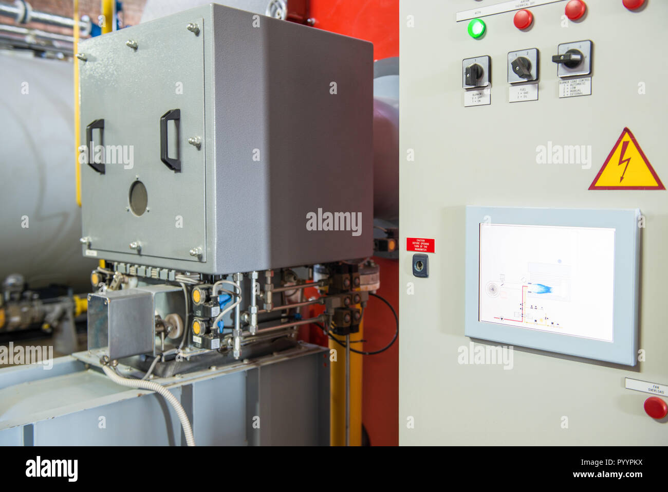 modern industrial boiler room with compressor equipment. control panel ...