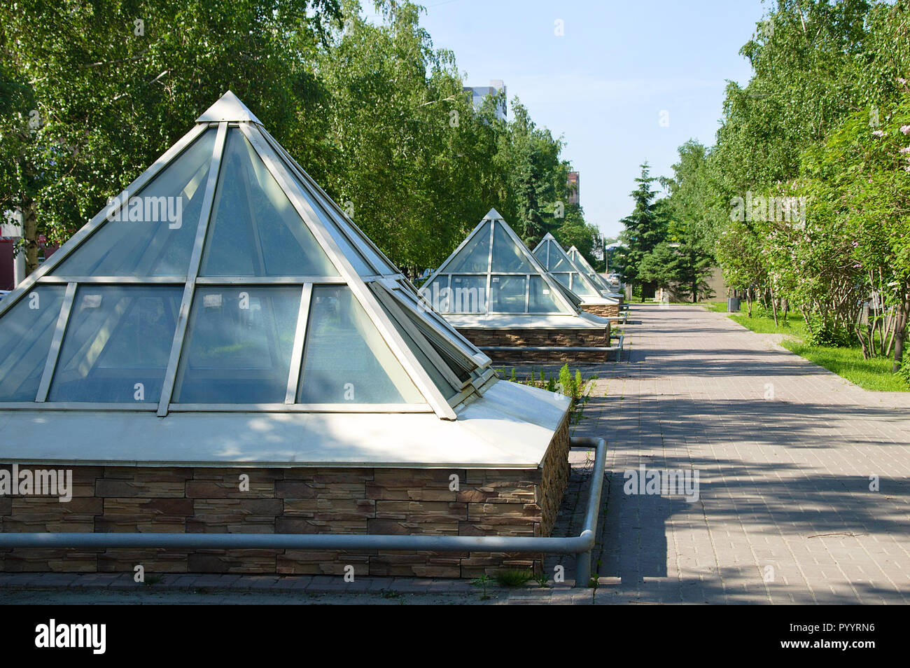 Buildings in the form of a pyramid. In the city Stock Photo - Alamy