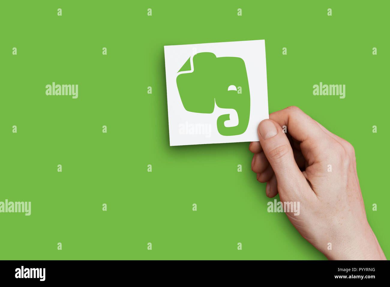 LONDON, UK - October 30th 2018: Hand holding Evernote logo. Evernote is ...