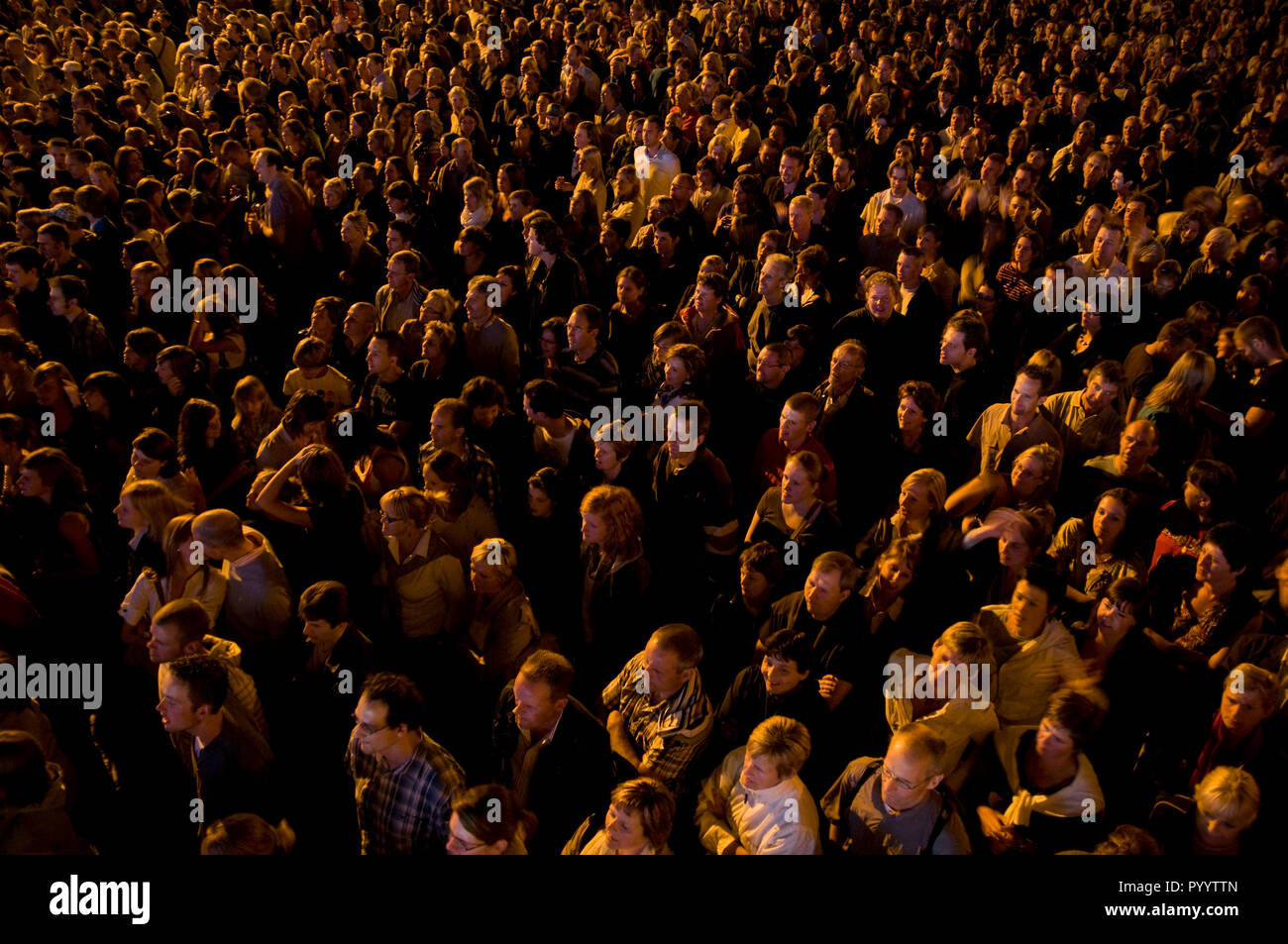 Aerial image of colorful stage light falling on the public during a ...