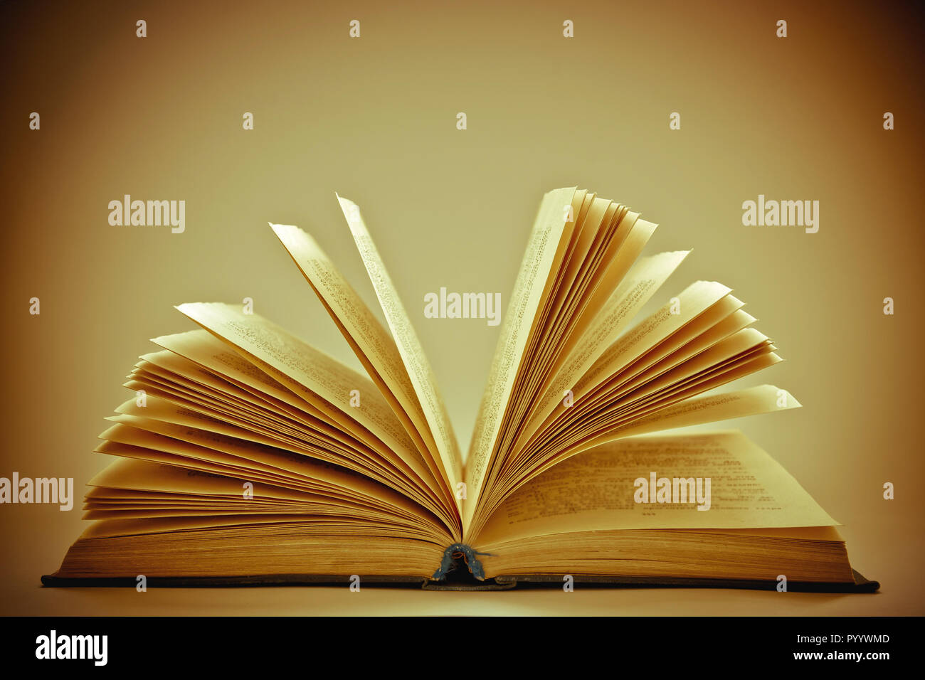 Image of open encyclopedia hi-res stock photography and images - Alamy