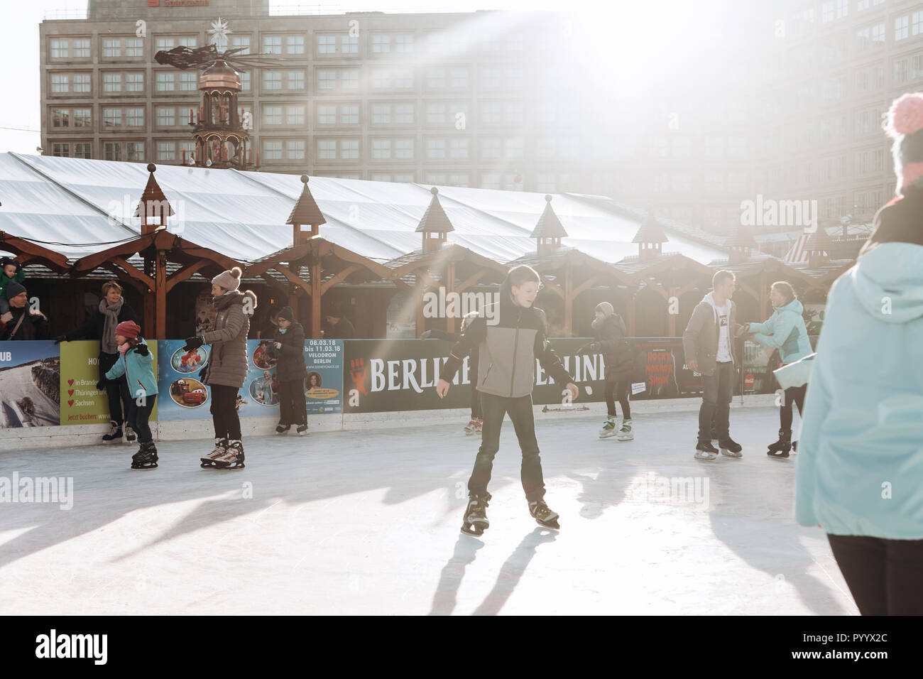 Berlin, December 25, 2017: People ride on an open skating rink on ...