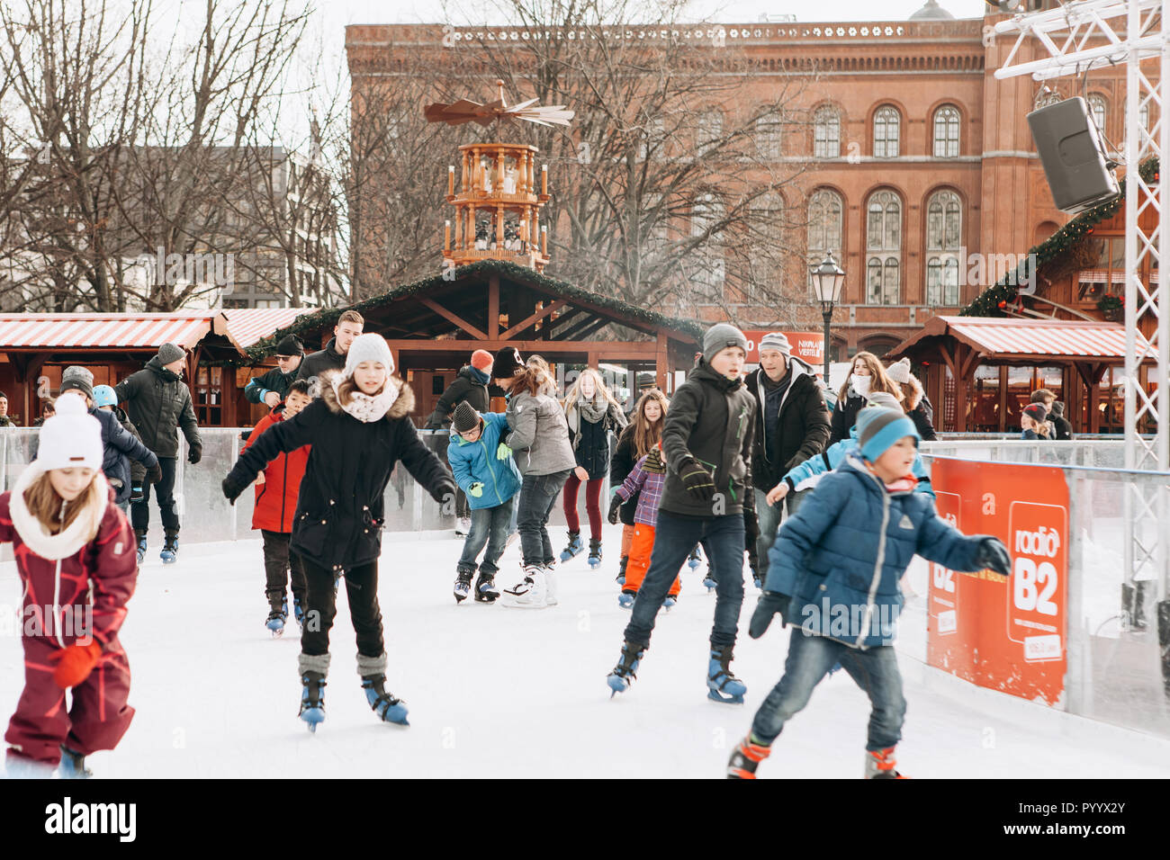Berlin, December 25, 2017: People ride on an open skating rink on ...
