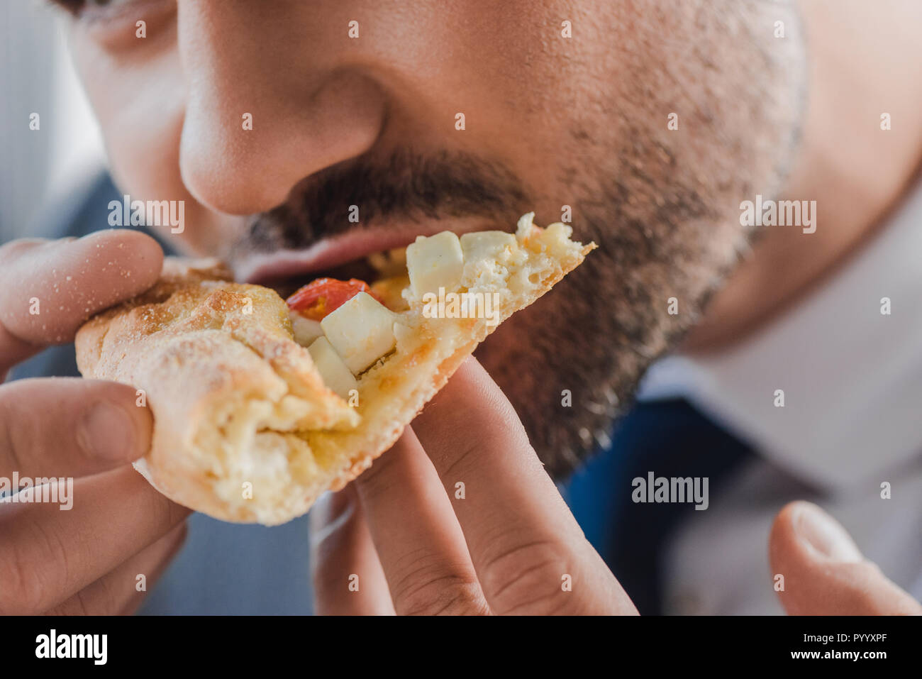 People eating pizza manager hi-res stock photography and images - Alamy