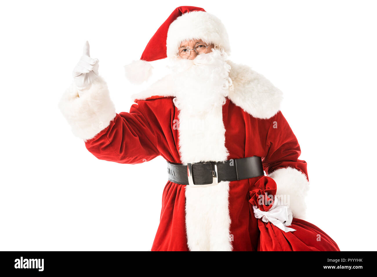 santa claus pointing up while looking at camera isolated on white Stock ...