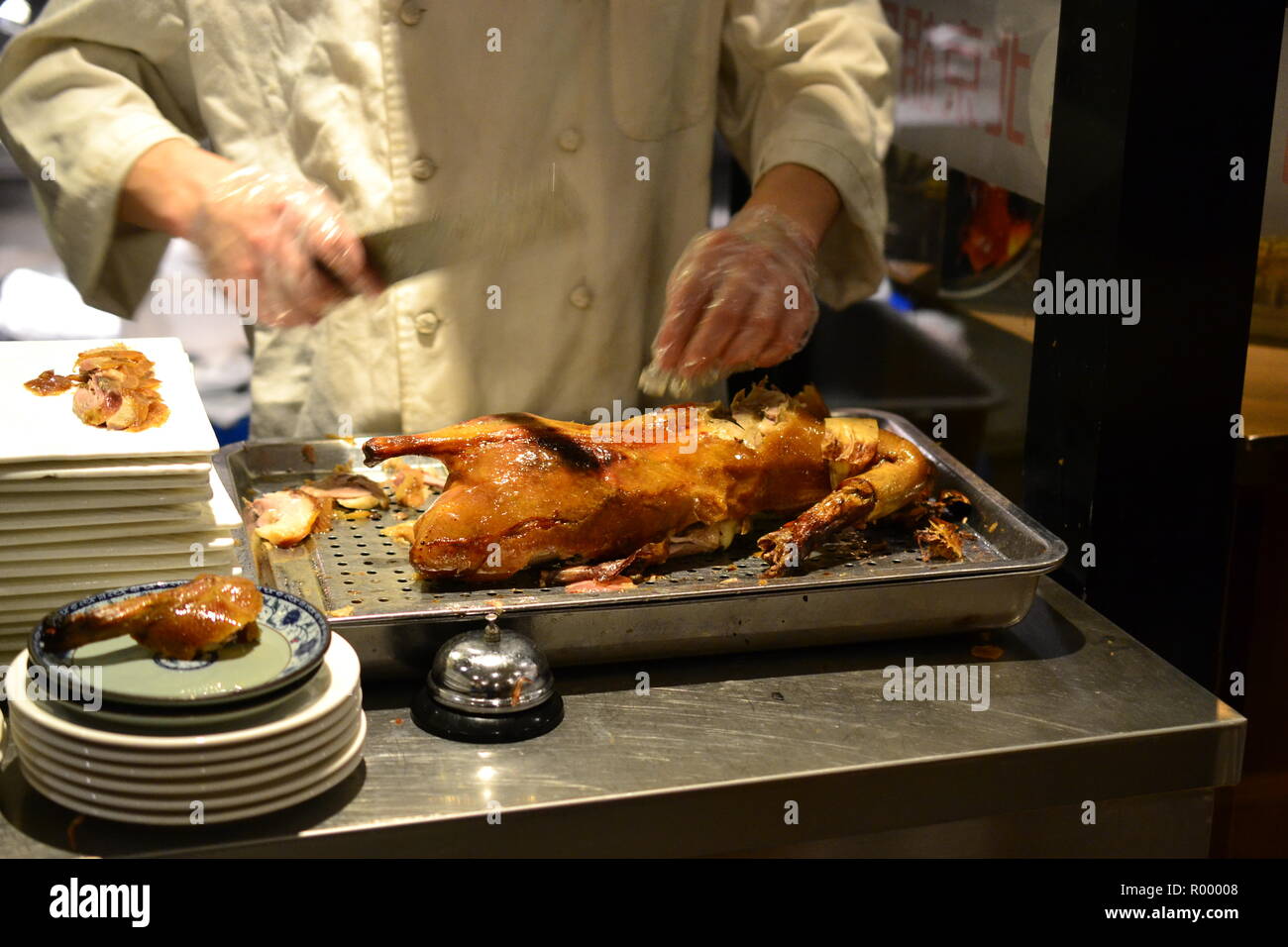Beijing Peking Duck in preparation, with side dish, authentic Chinese ...