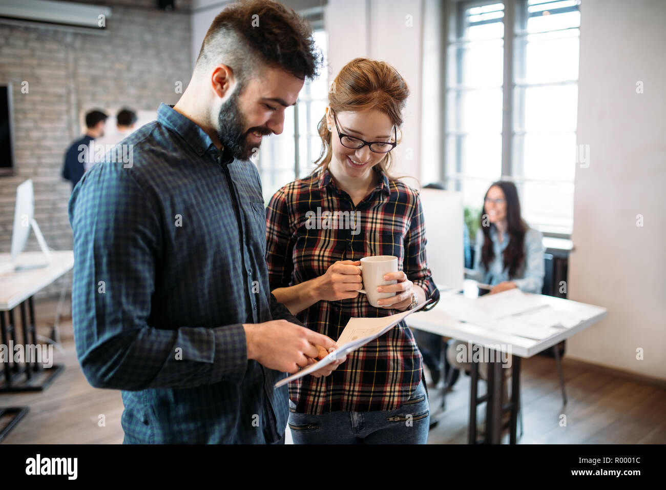 Portrait students discussing together hi-res stock photography and ...