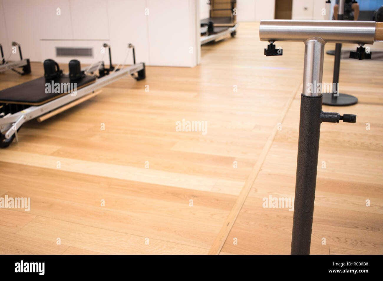 Pilates fitness studio gym room with training dance ballet bar for ...