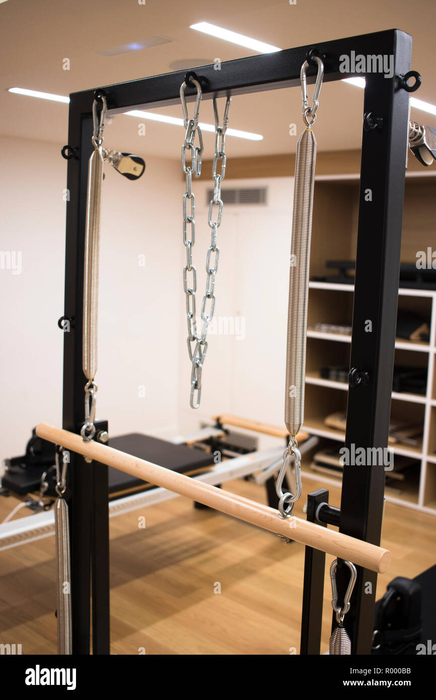 Pilates machine fitness studio gym room with training machines Stock ...
