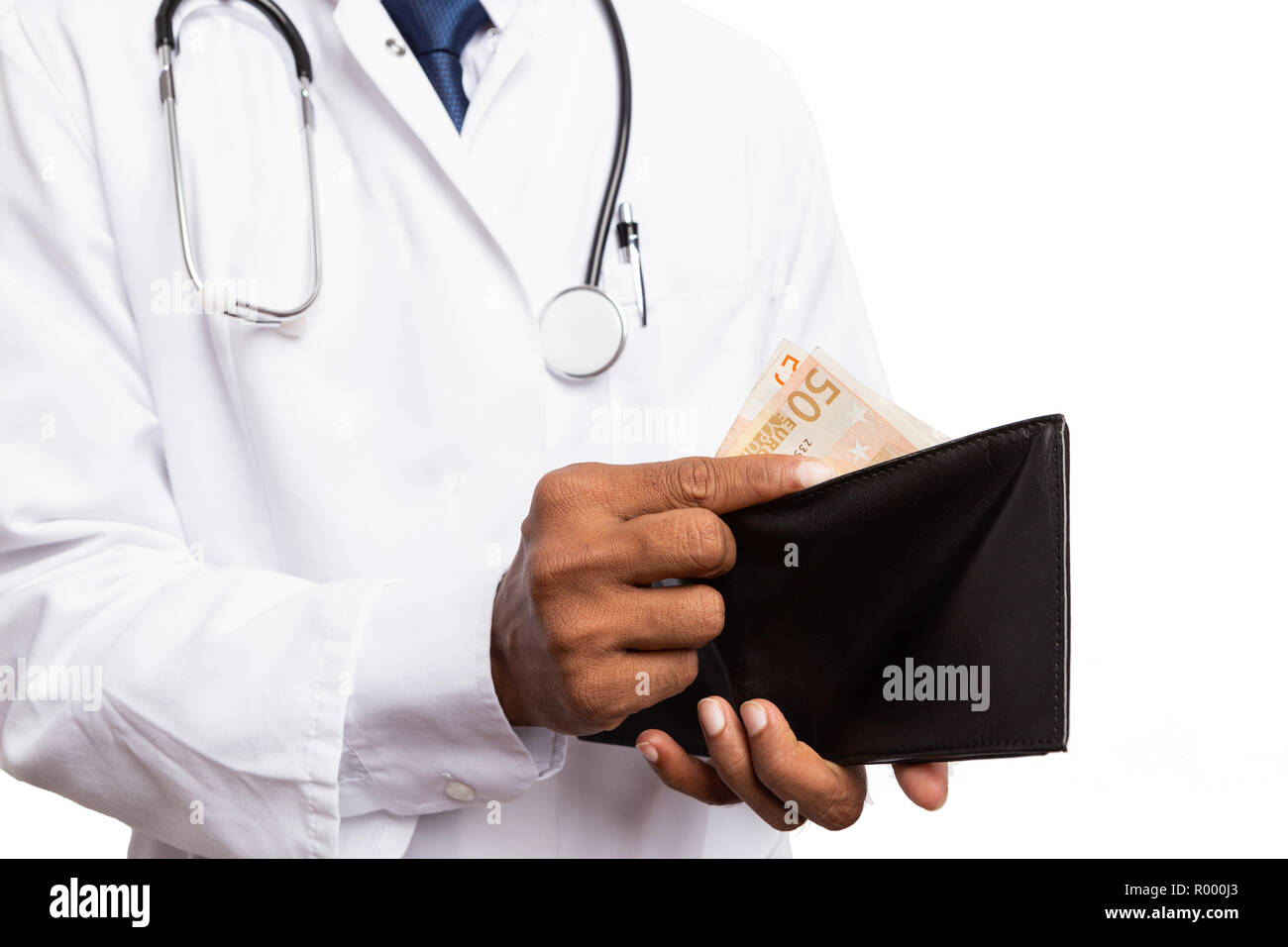 Indian doctor man counting money in wallet close-up isolated on white ...