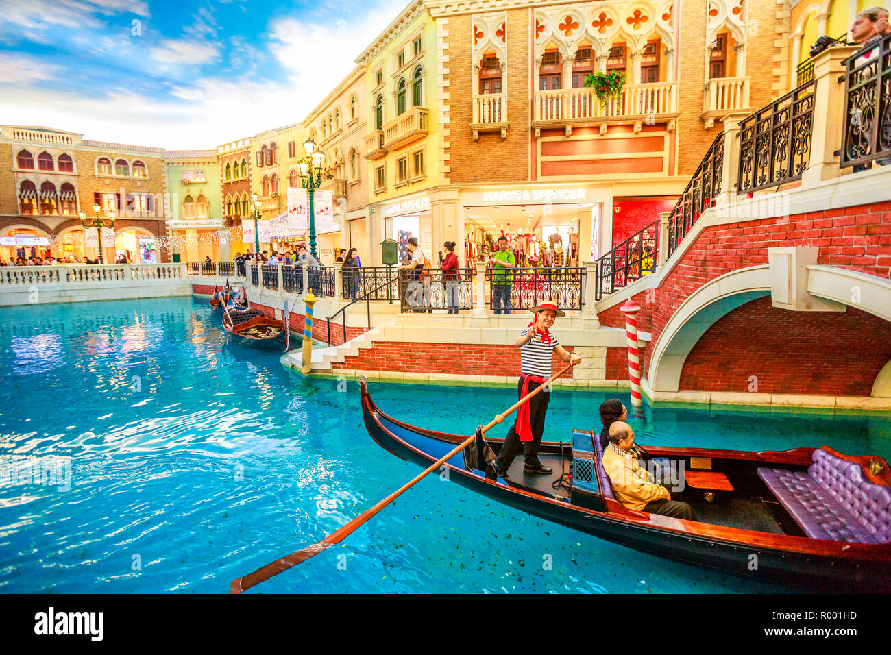 Macau, China - December 9, 2016: gondolier on famous italian gondola ...