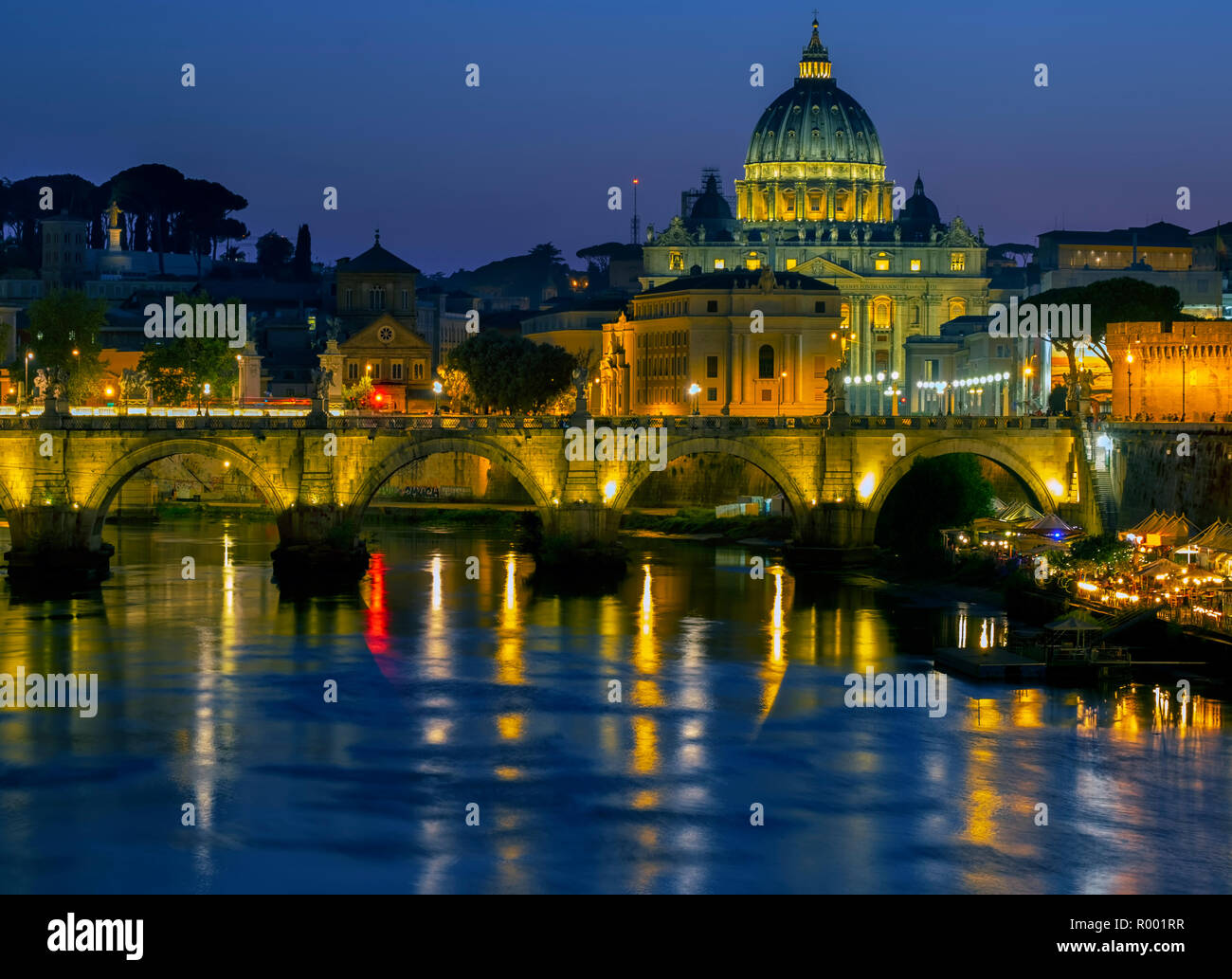 Night image of St. Peter's Basilica from the Ponte Sant Angelo and ...